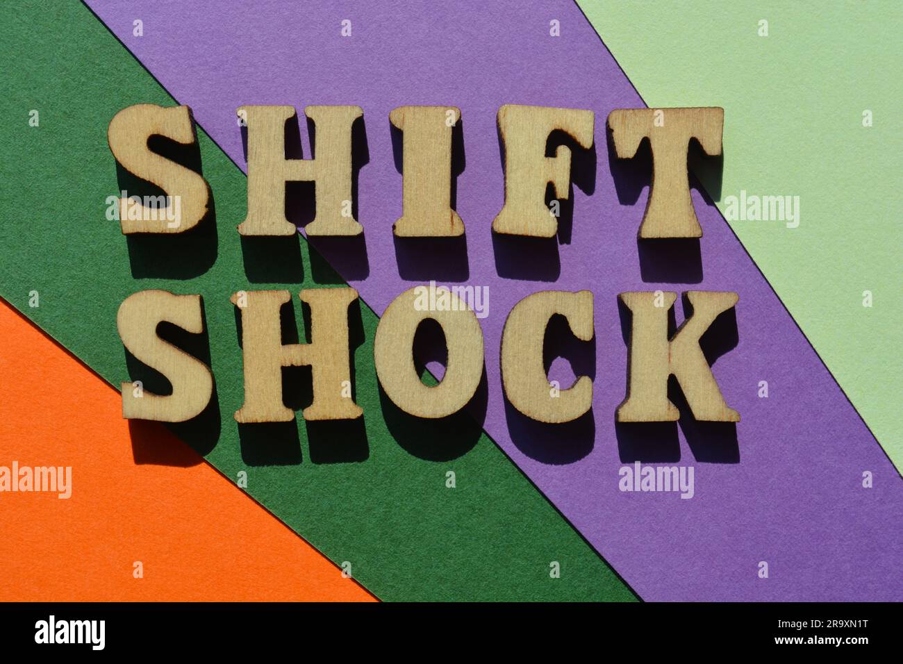 Shift Shock, words in wooden alphabet letters isolated on background as ...