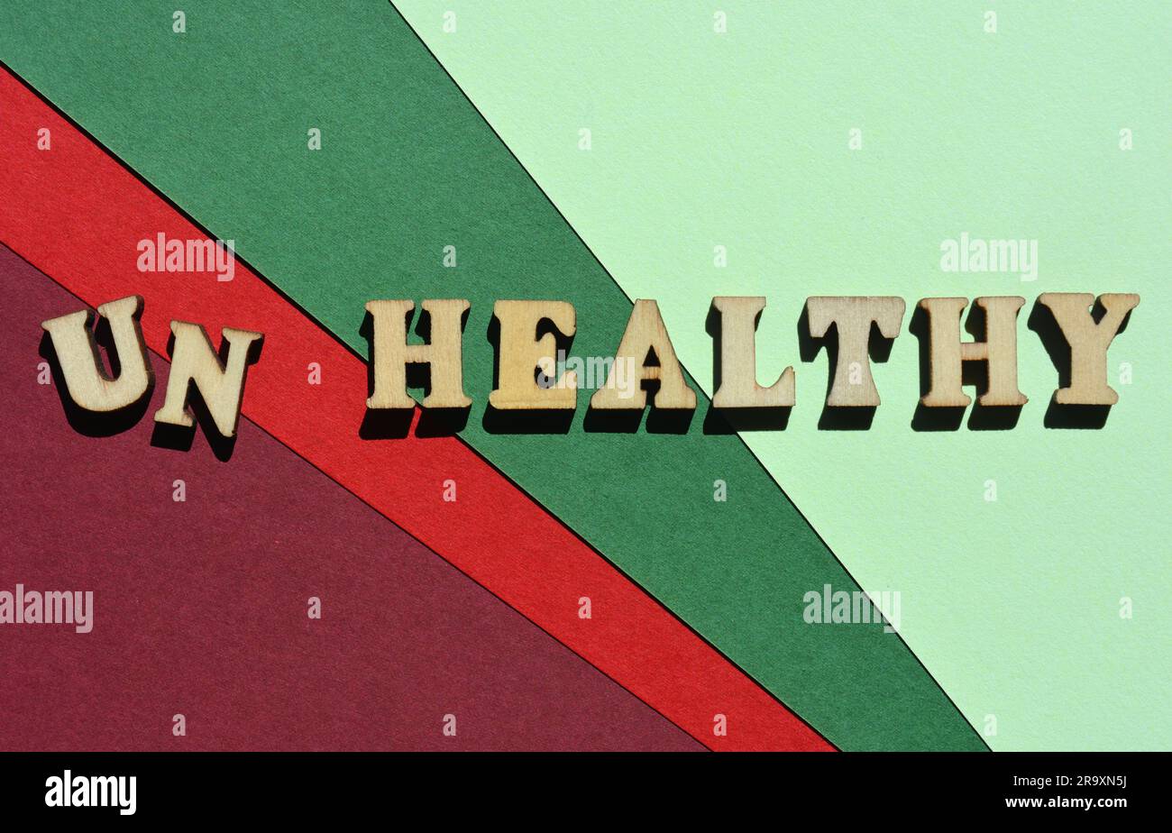 Healthy, Unhealthy, words with opposite meanings in wooden alphabet ...