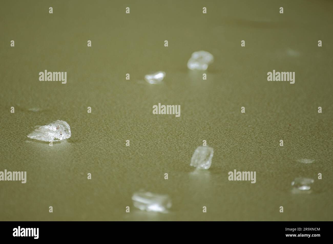 Transparent chunks of ice on frozen water surface Stock Photo - Alamy