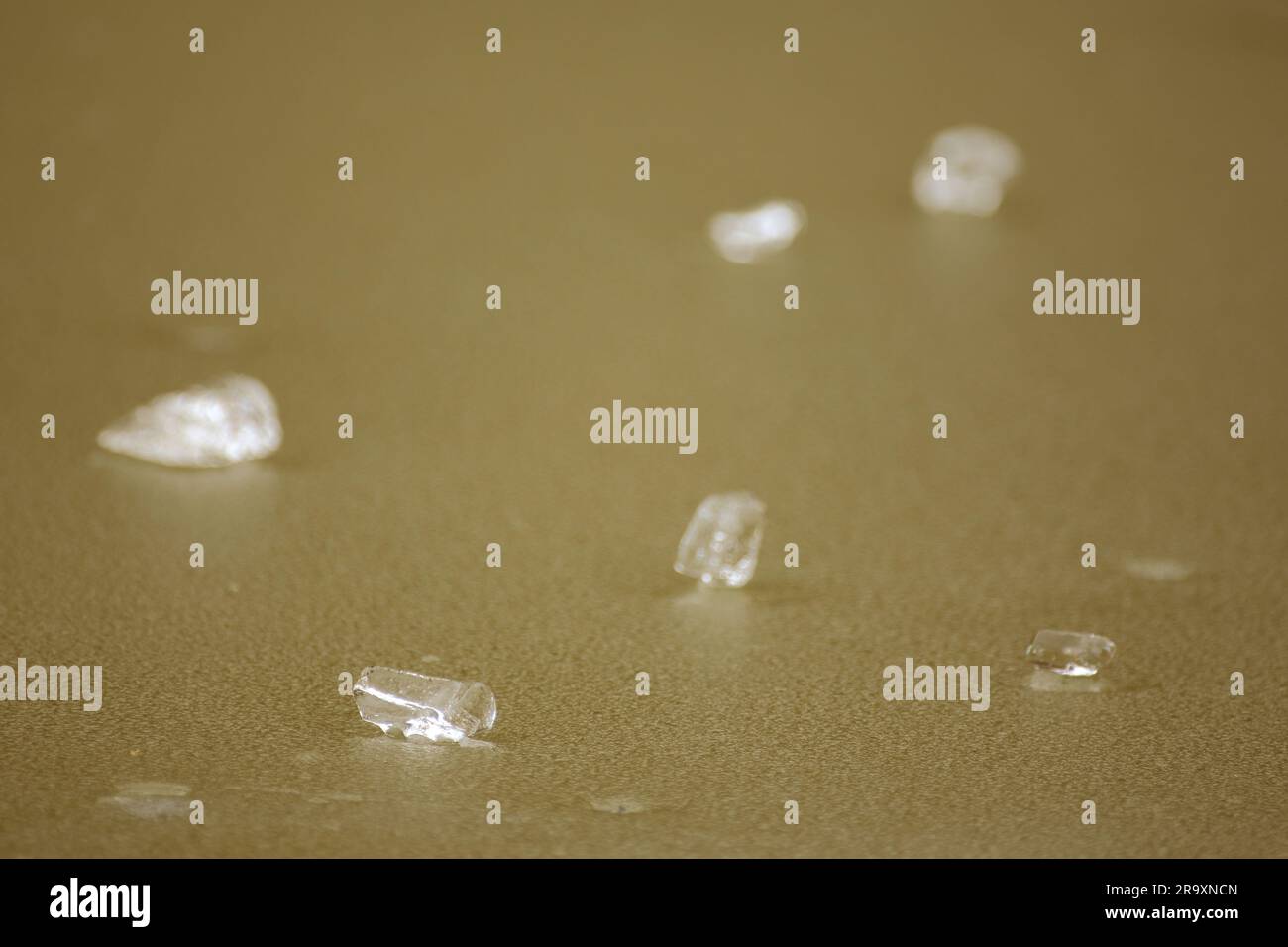 Transparent chunks of ice on frozen water surface Stock Photo - Alamy