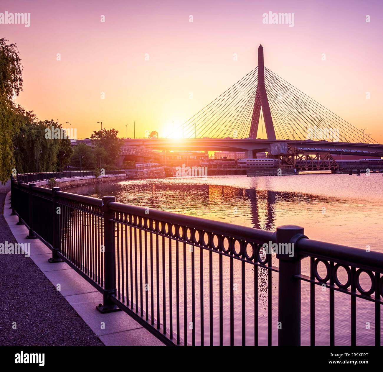 The city of Boston in Massachusetts, USA at sunrise with the Zakim ...