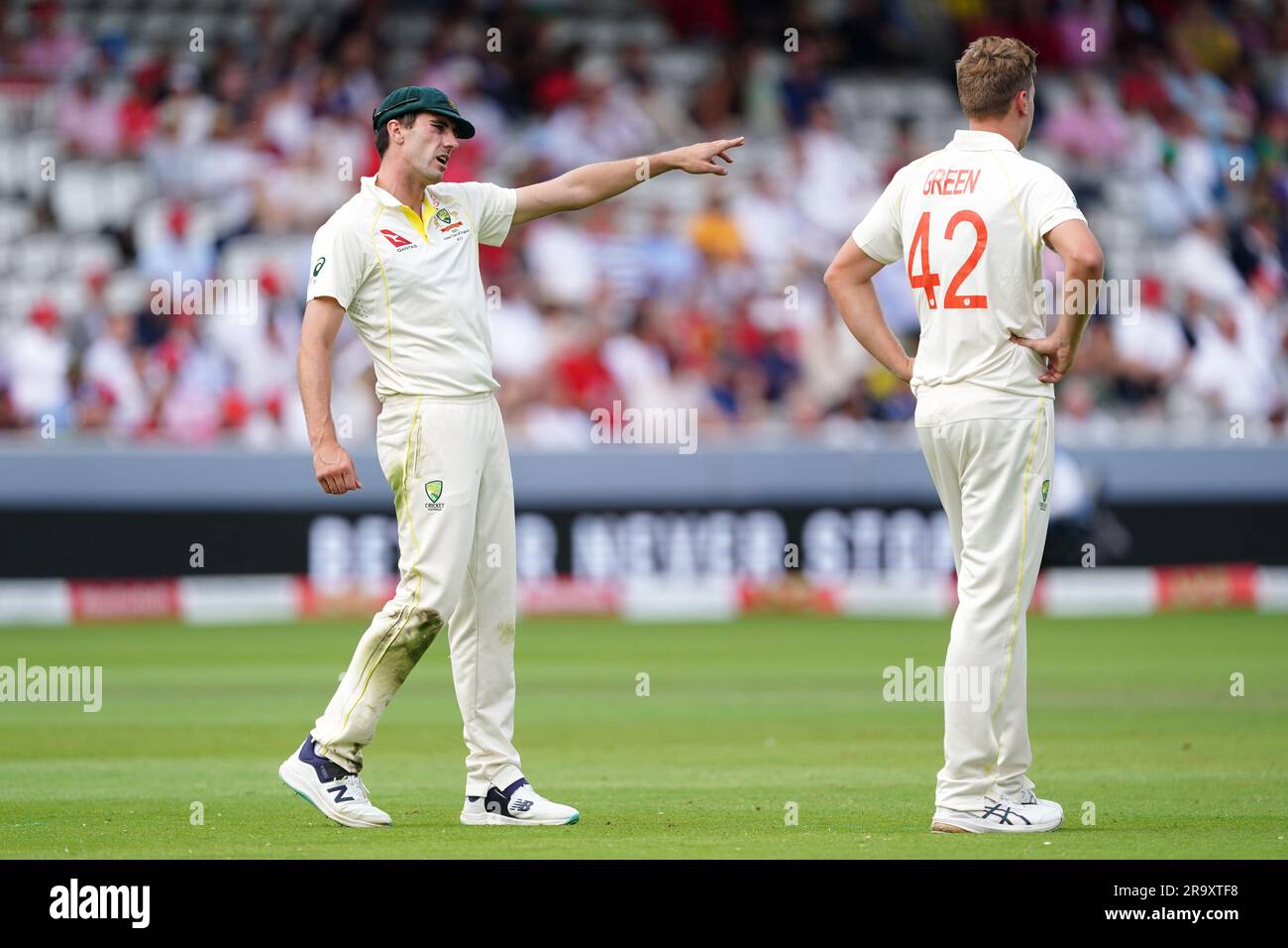 Australia's Pat Cummins signals he will go off the field for treatment ...