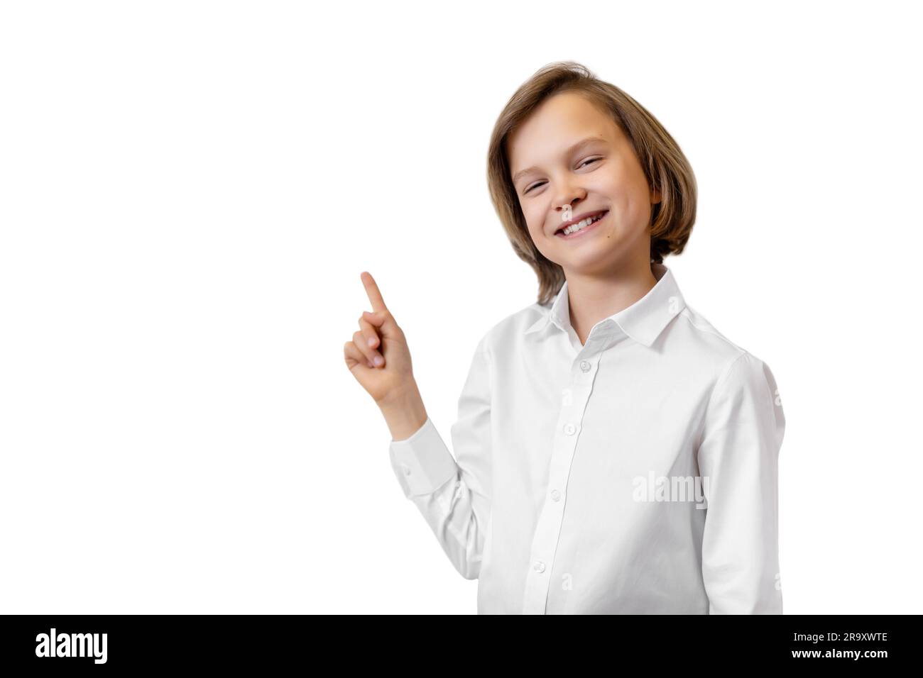 Portrait of cute little happy confident curious schoolboy smiling ...