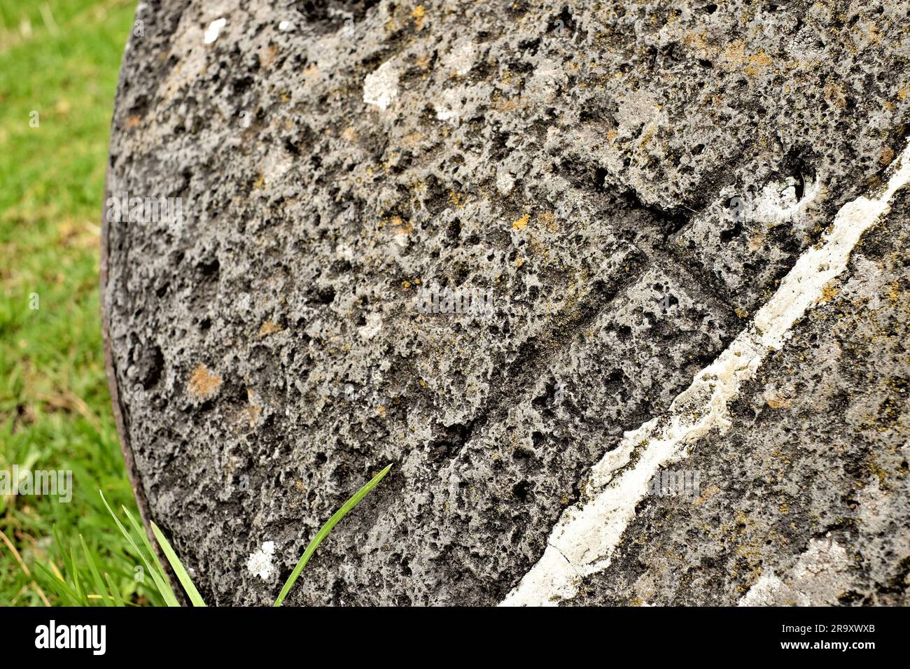 Christian cross symbol carved in old stone element Stock Photo - Alamy