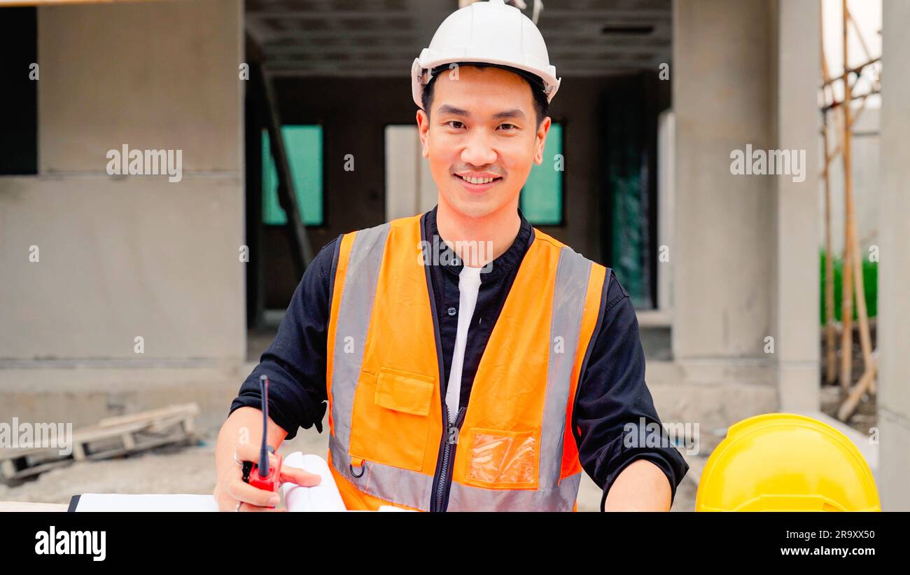 Portrait of cvil engineer with safety uniform working at construction ...