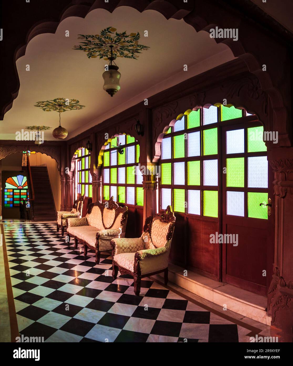 Light from multicoloured stained glass window panes through haze Stock ...