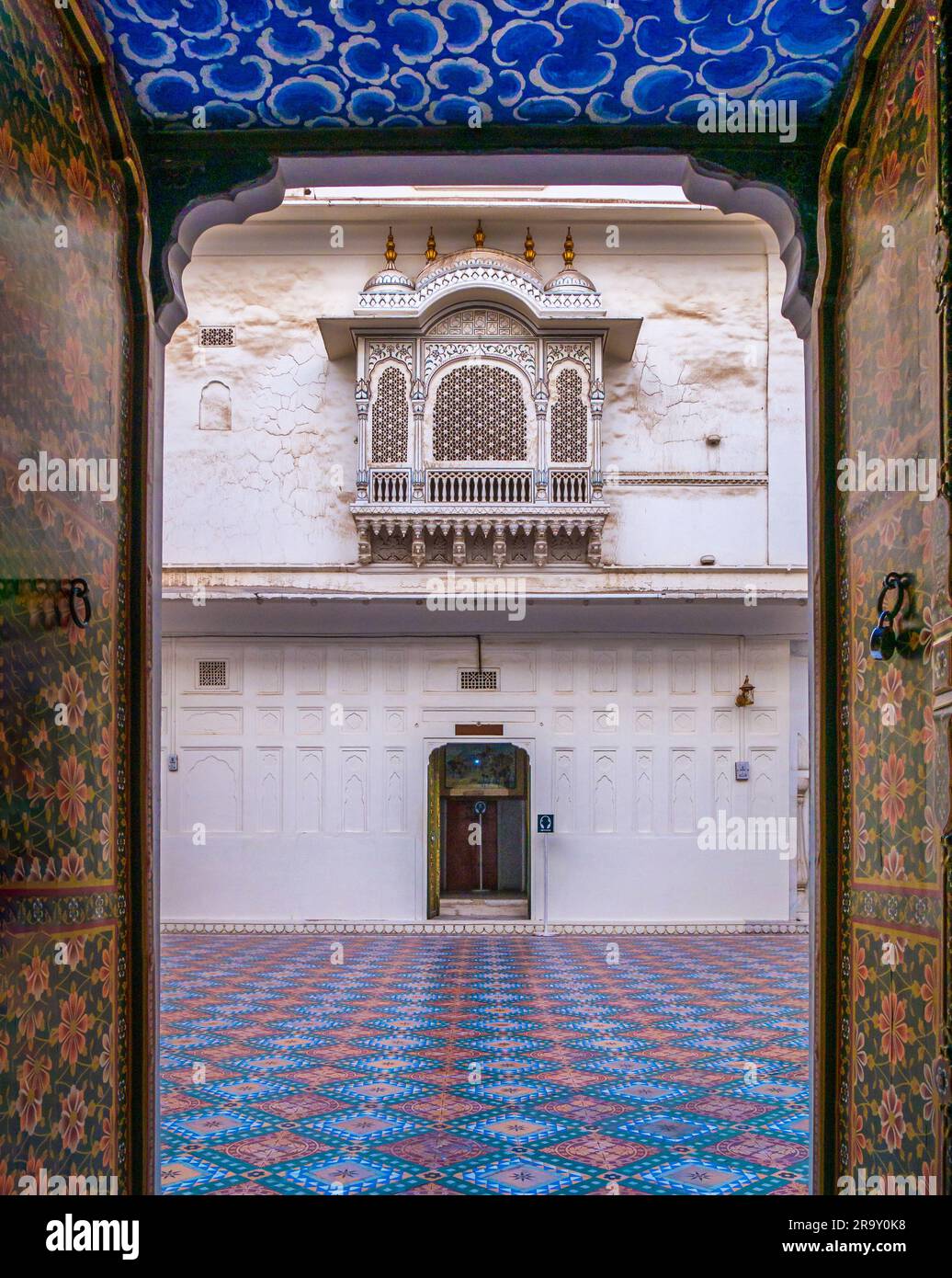 Artistic window and doors & colourful flooring tiles of Indian fort in ...