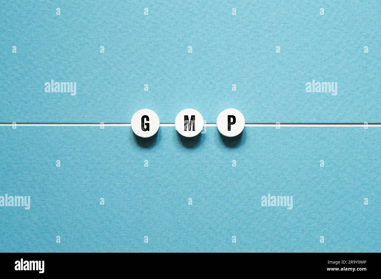 GMP - word concept on building blocks, text Stock Photo - Alamy