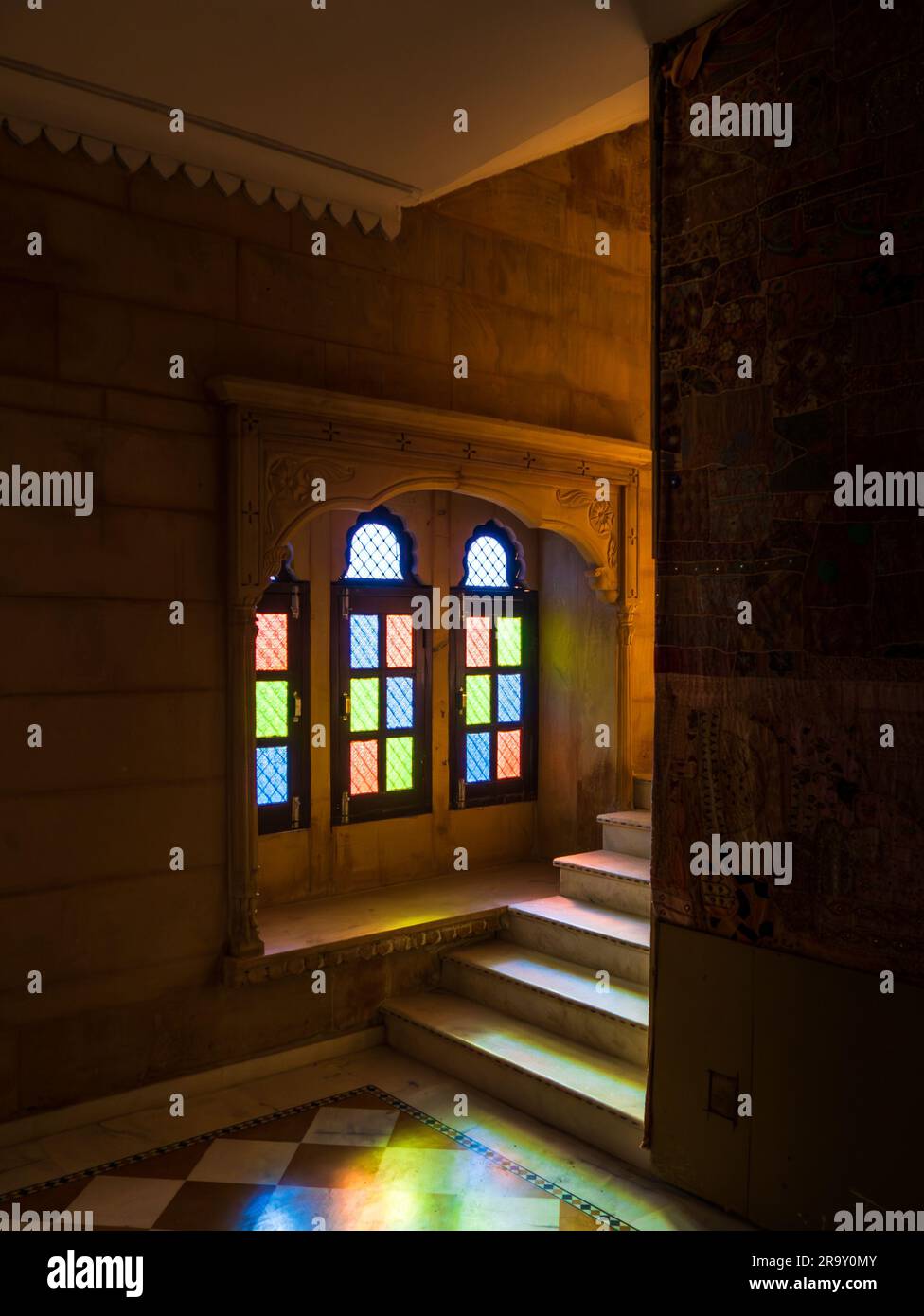 Light from multicoloured stained glass window panes through haze Stock ...