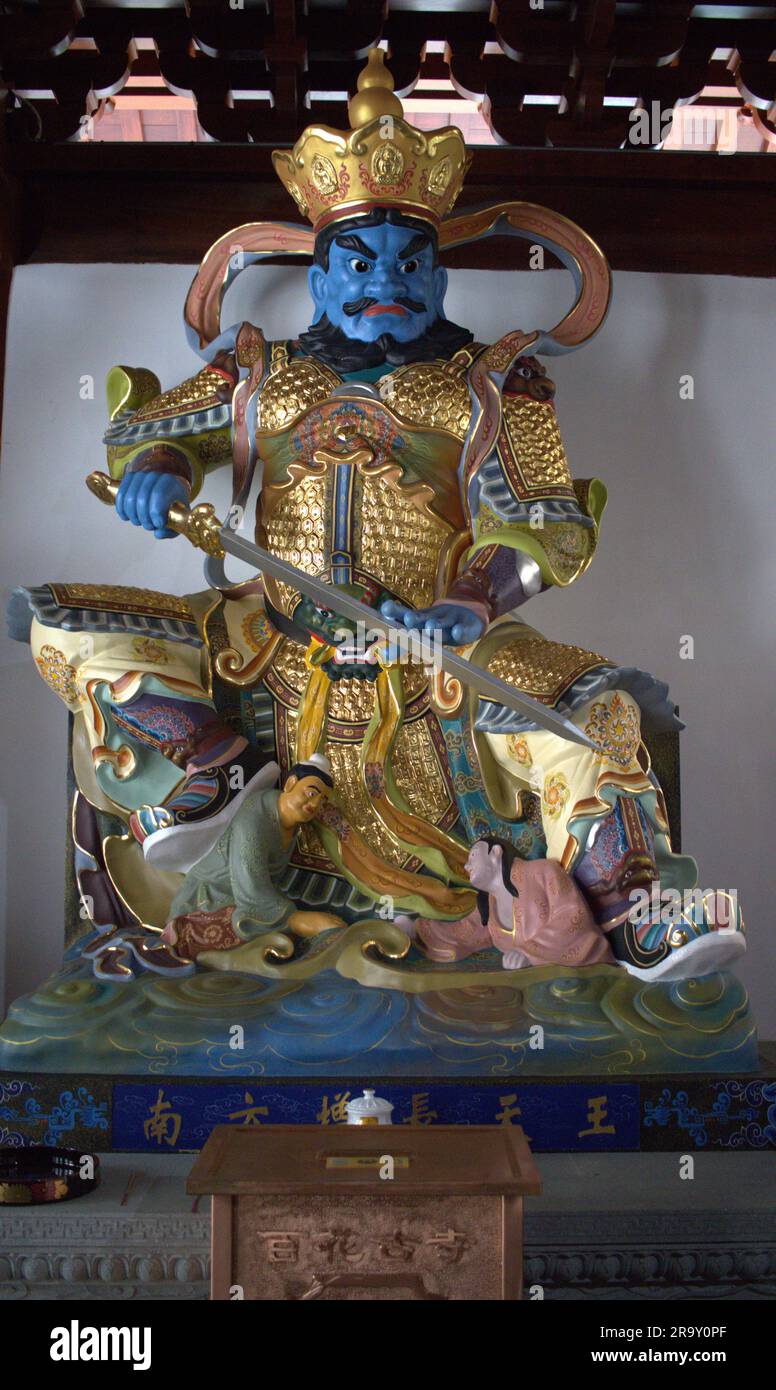 Buddhist Idol In Temple Stock Photo - Alamy