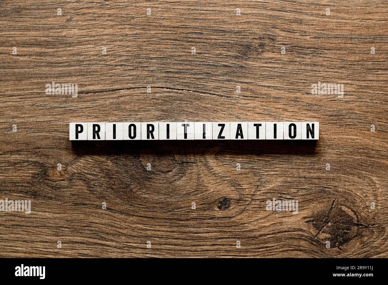 Prioritization - word concept on building blocks, text Stock Photo - Alamy