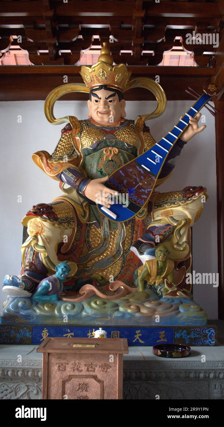 Buddhist Idol In Temple Stock Photo - Alamy