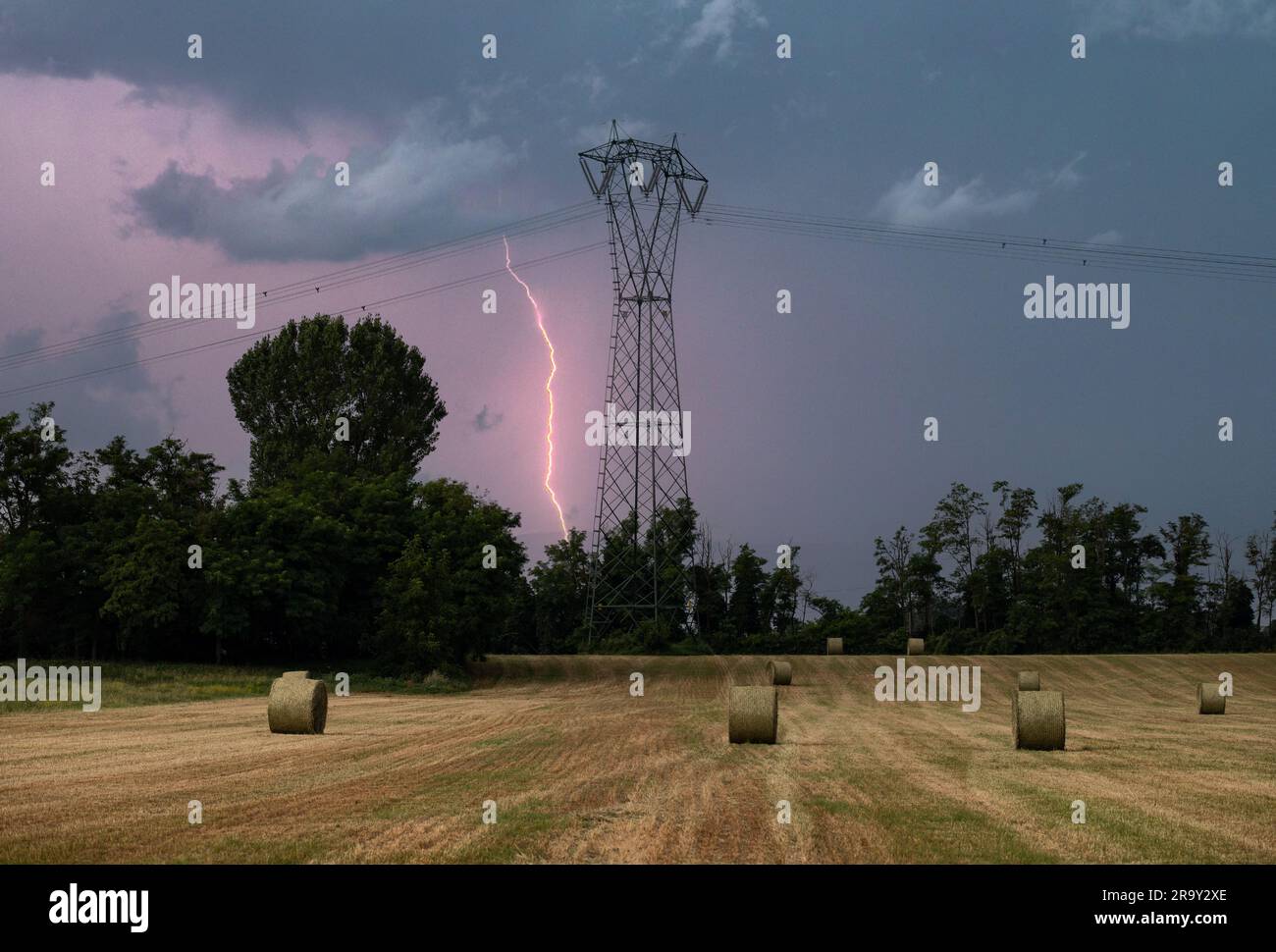 Lightning strike on the energy transition power line Stock Photo - Alamy