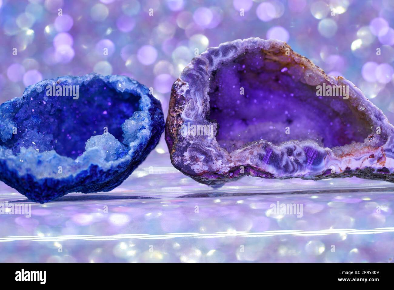Blue quartz with sparkling crystals and glass balls Stock Photo - Alamy