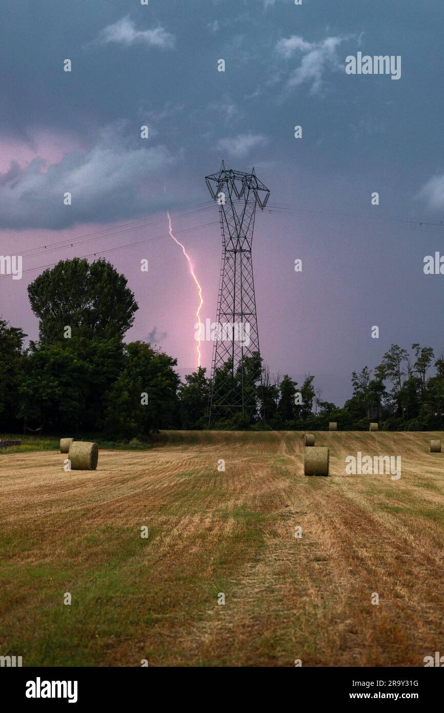 Lightning strike on the energy transition power line Stock Photo - Alamy
