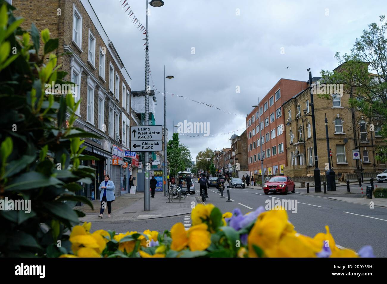 London- May 2023: Acton High Street shops and street scene, and area of ...