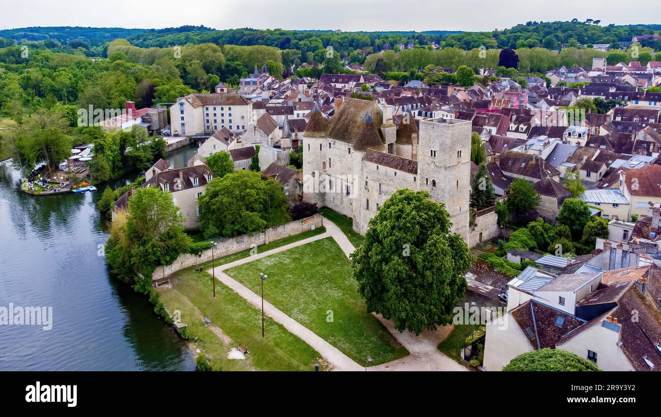 Aerial view of the medieval castle of Nemours in the town of the same ...