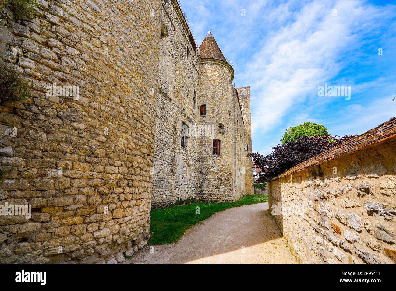 Round tower of the medieval castle of Nemours in the town of the same ...