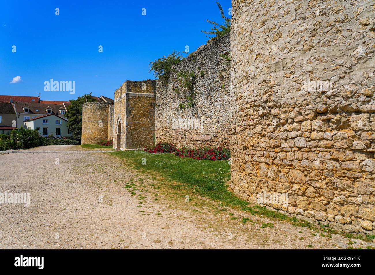 Round corner tower of the medieval castle of Brie Comte Robert in the ...