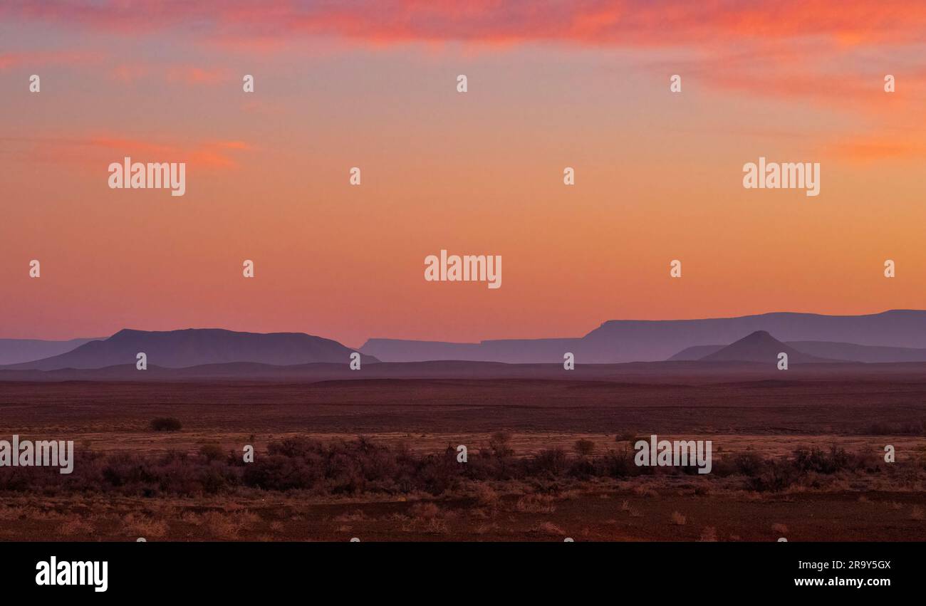 Toward the Roggeveld mountain range. A sunset over the desert of the ...