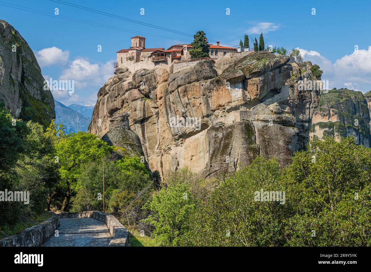 The picture shows an ancient Greek Orthodox monastery situated in a ...