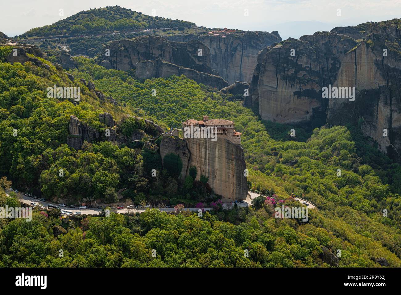 An aerial view of a rocky and wooded mountain landscape, with trees and ...