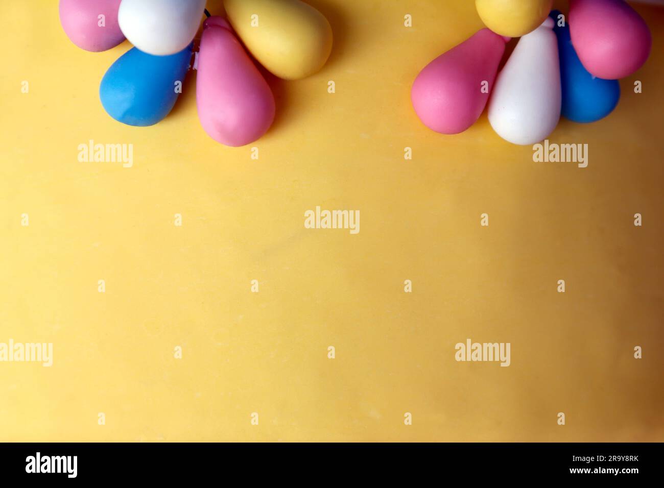 yellow backdrop with colorful balls - birthday party with bold colors ...