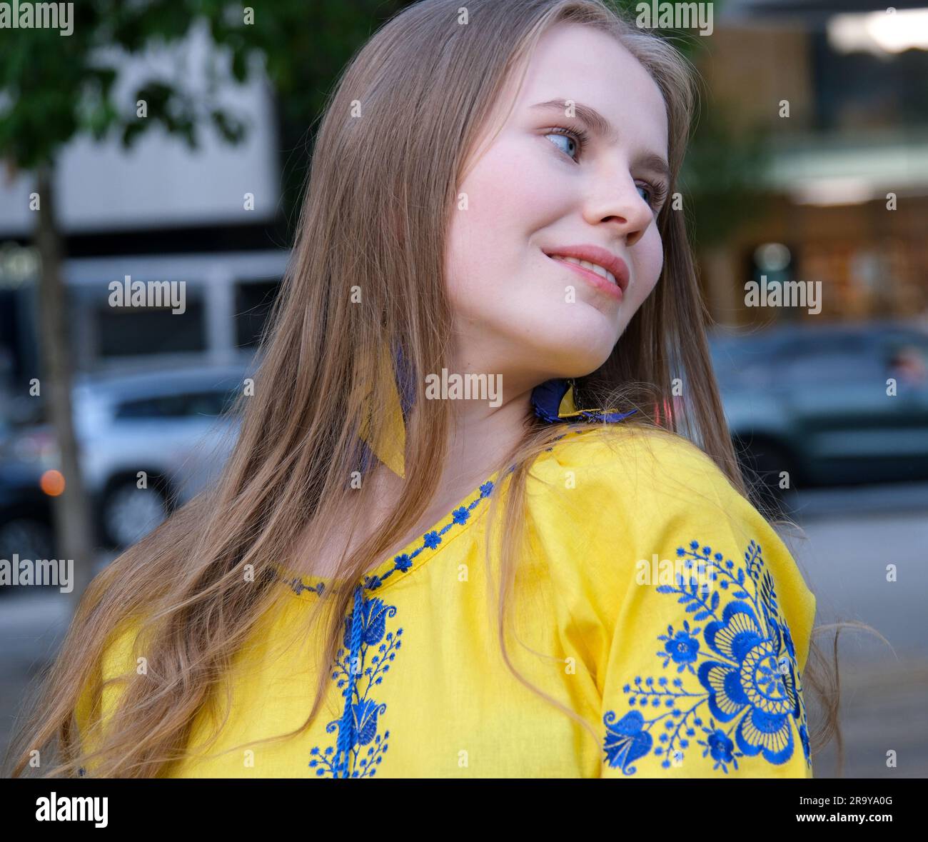 yellow shirt with blue flowers embroidery beautiful young girl. Woman ...