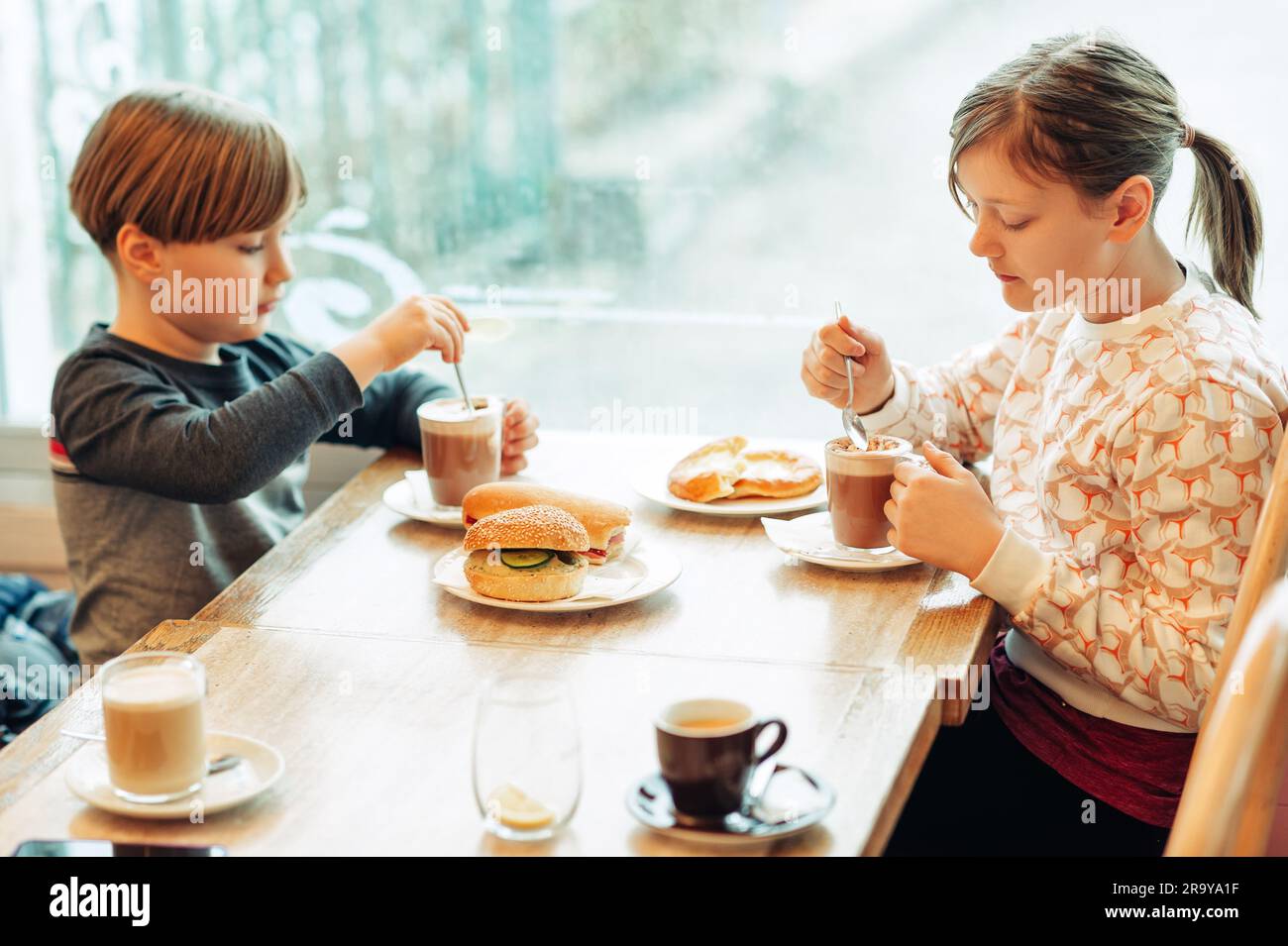 Children drinking hot chocolate hi-res stock photography and images - Alamy