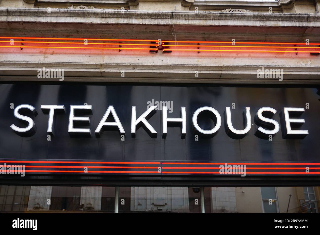 Steakhouse sign on restaurant building exterior. food eatery signage ...