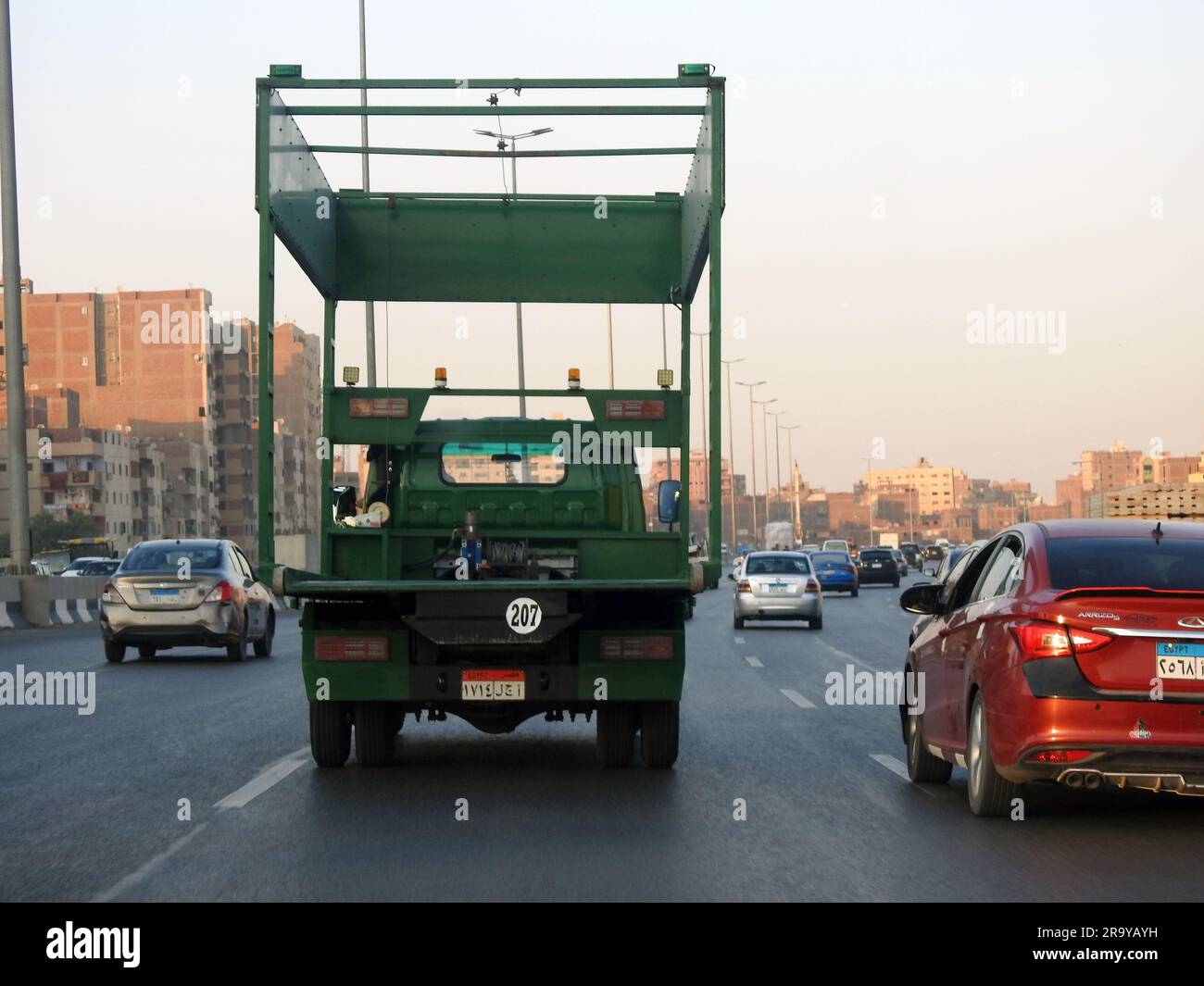Cairo, Egypt, June 23 2023: Electric vehicle mounted lifting hoist on a ...