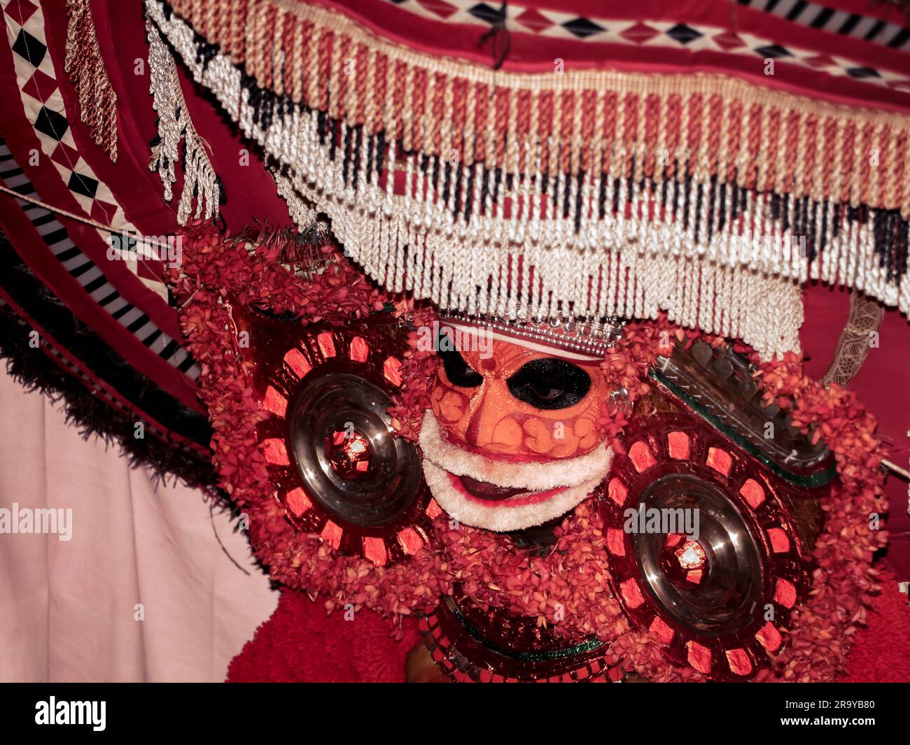 Person in a theyyam dance costume hi-res stock photography and images ...