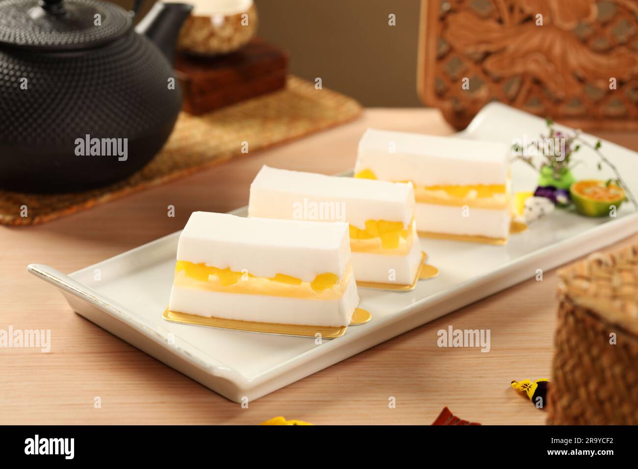 yumcha, dim sum,Coconut bar with mango Stock Photo - Alamy