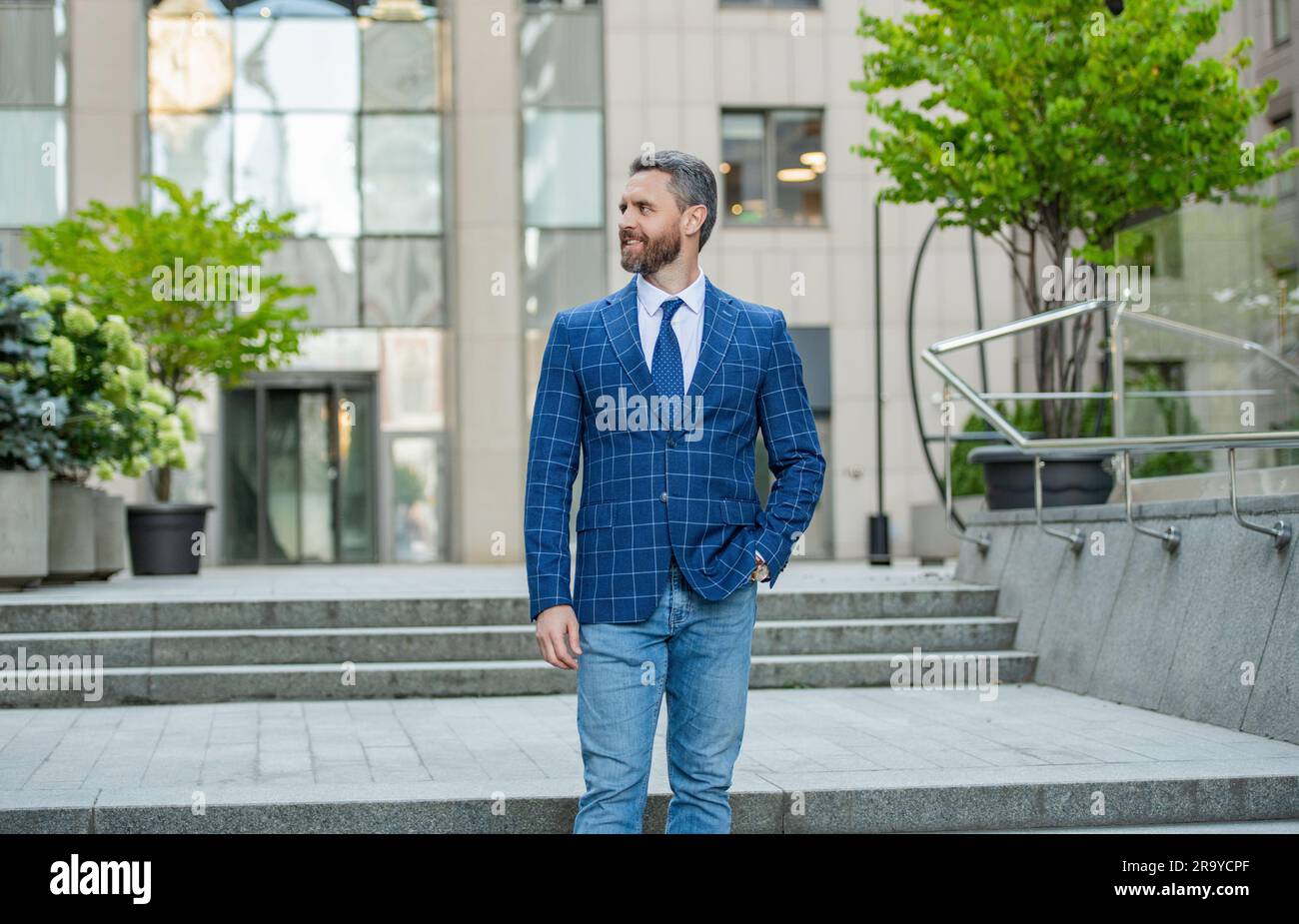 business ceo walk on urban background. business ceo wearing jacket in ...