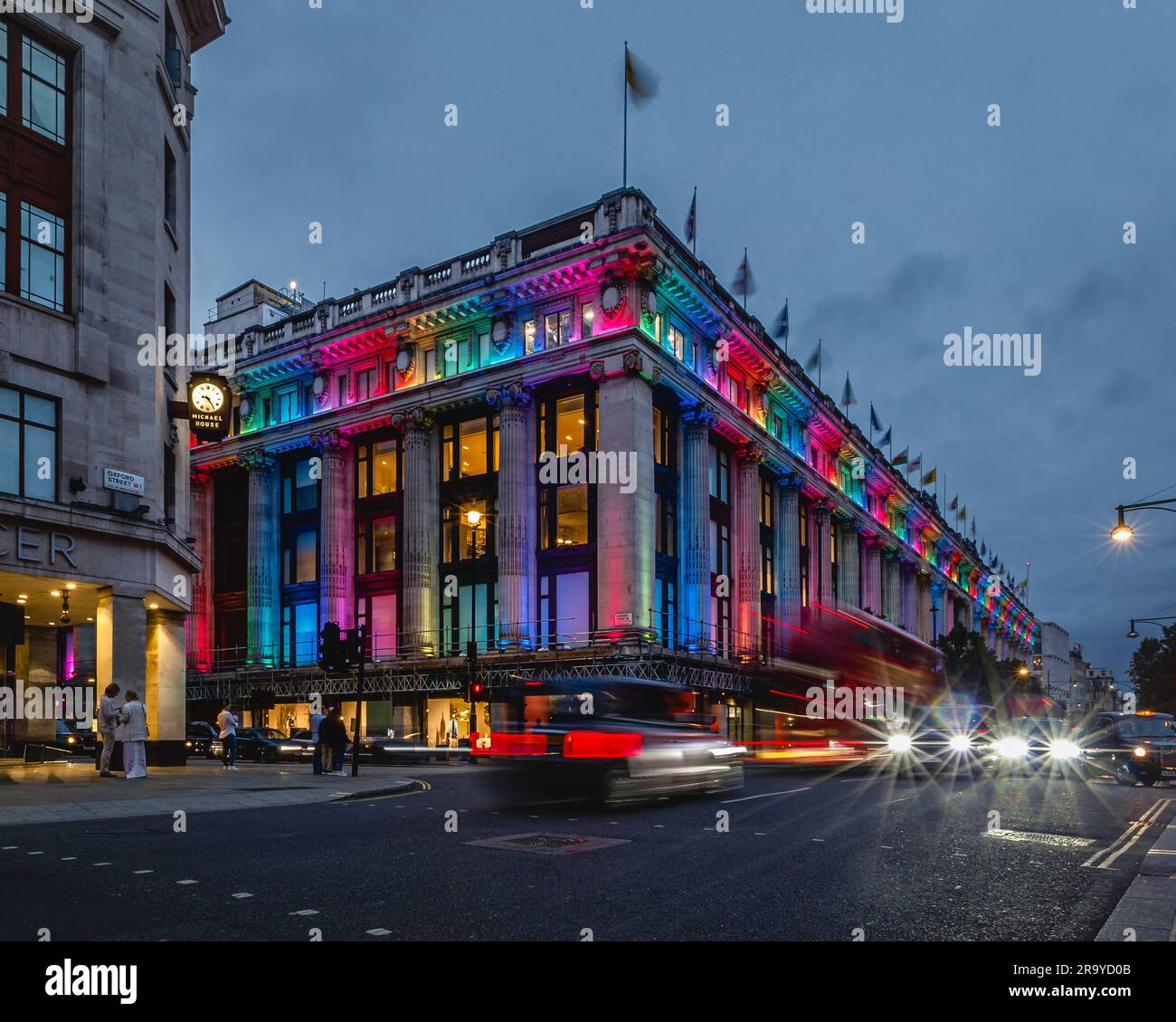 Facade rainbow lighting begins to pop as night falls in London ...