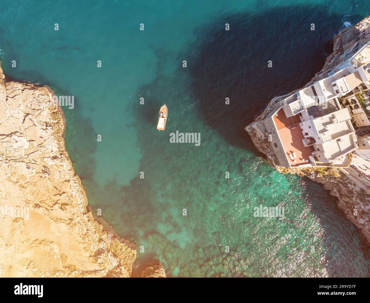 Aerial view of Polignano a Mare, a village built on the edge of the ...