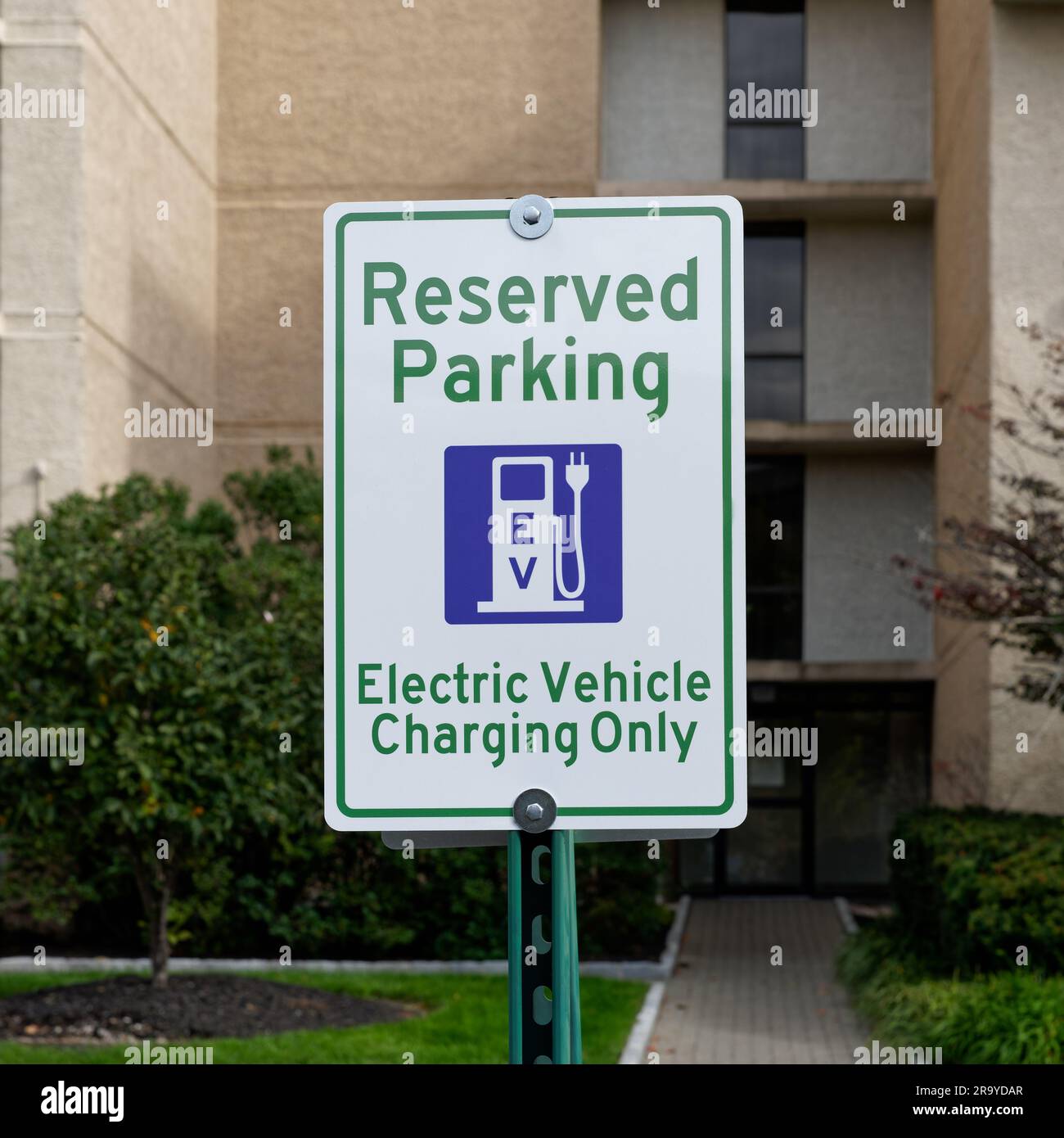 Reserved Parking Electric Vehicle Charging Only sign with pictograph ...