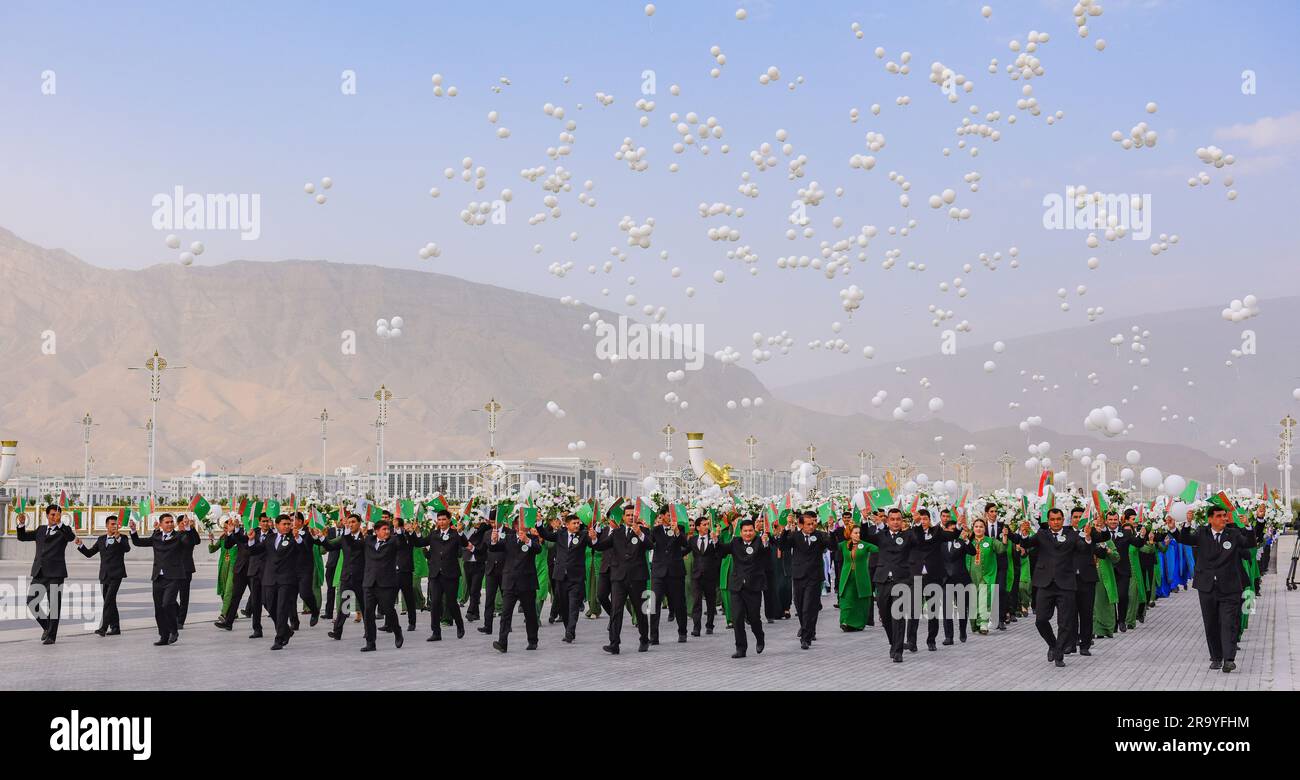 People walk during a ceremony of the officially opening of the new ...