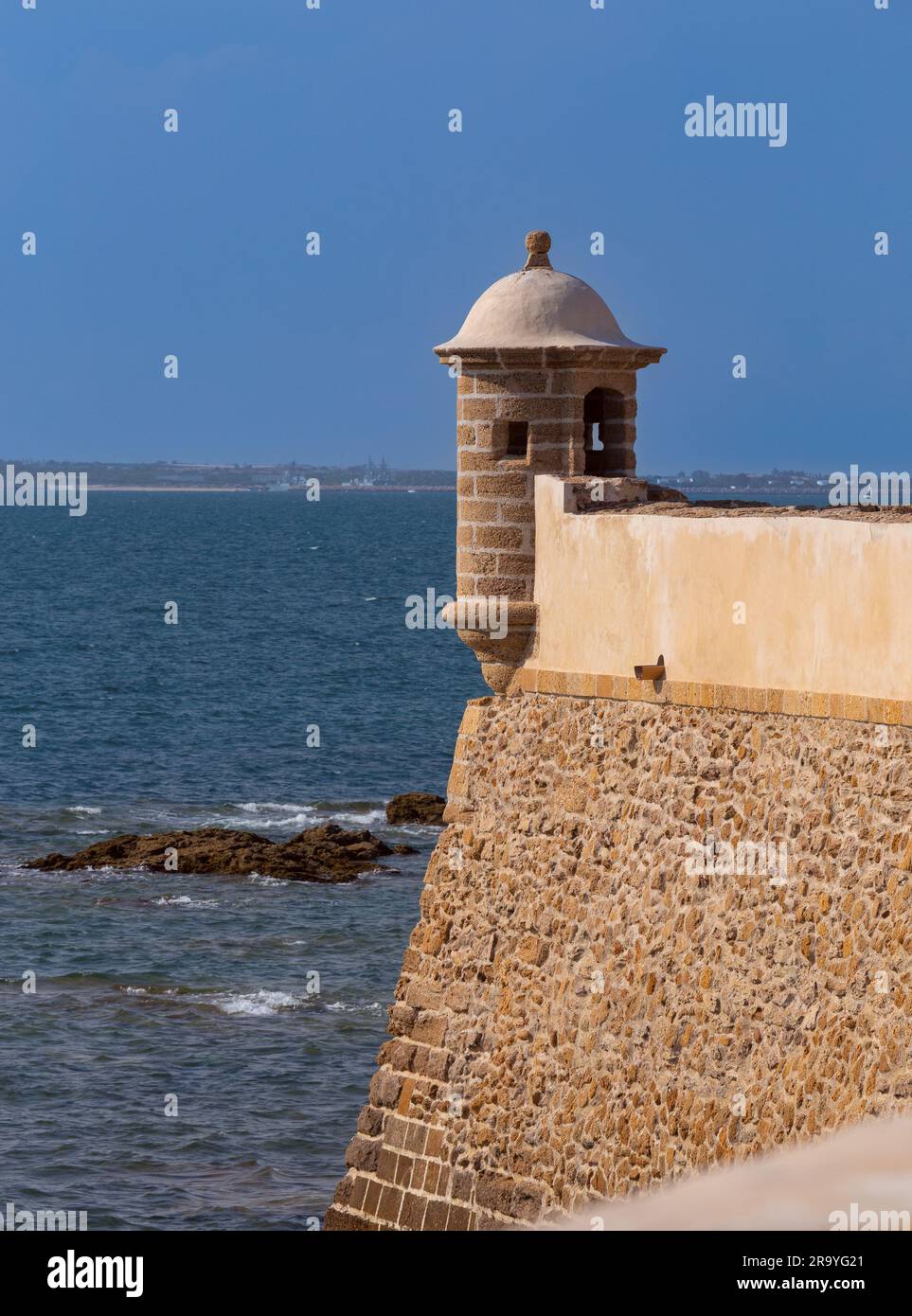 Old stone watchtowers on the waterfront of Cadiz. Spain. Andalusia ...