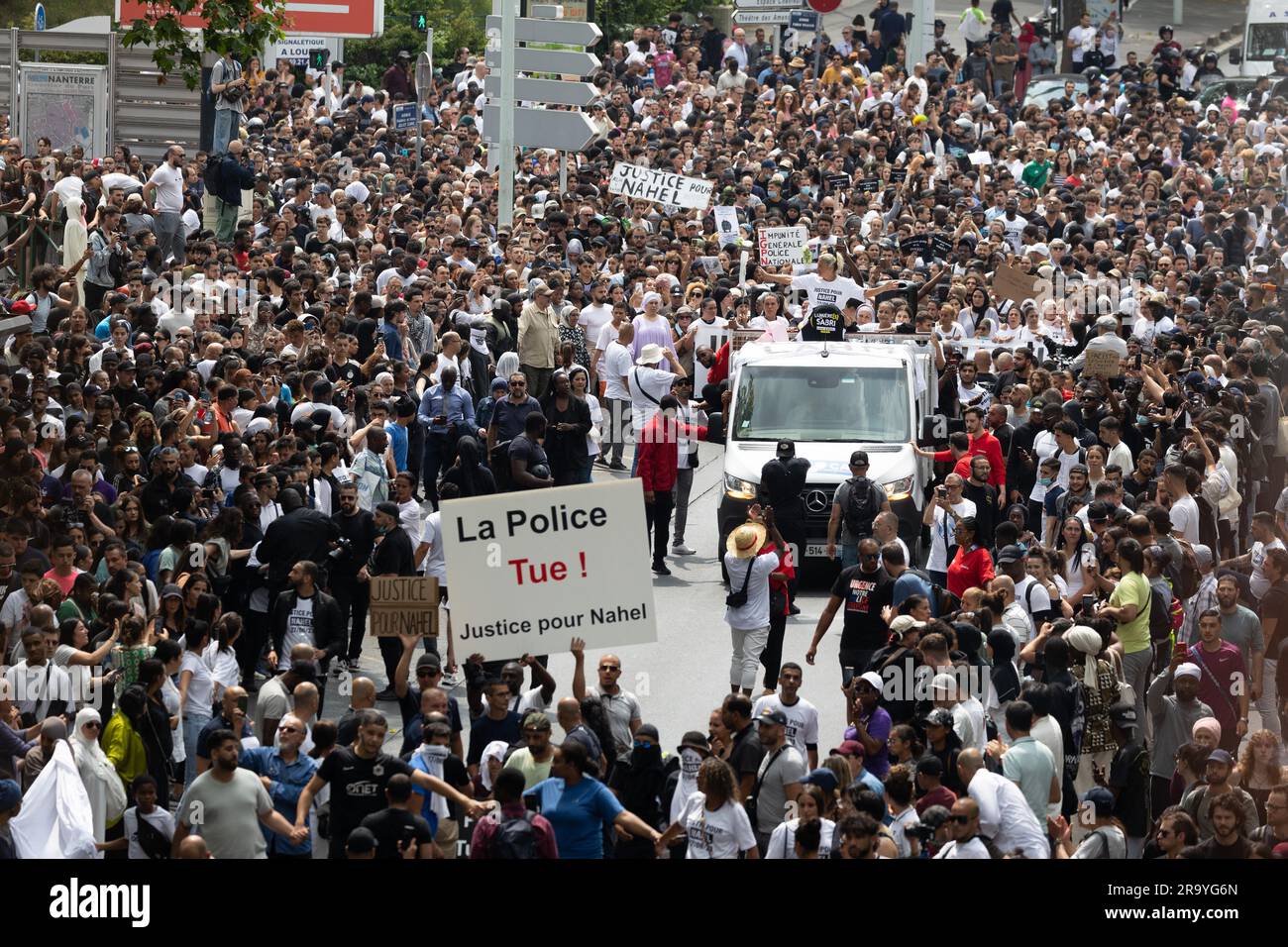 People during a commemoration march (marche blanche) for Nahel, in the ...