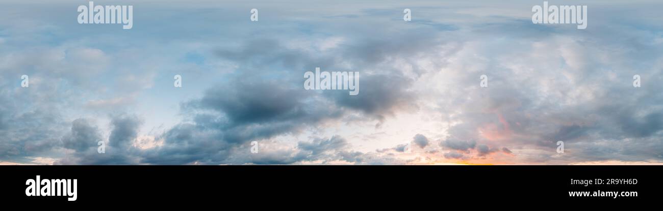 Dramatic sunset sky panorama with bright glowing red pink Cumulus ...