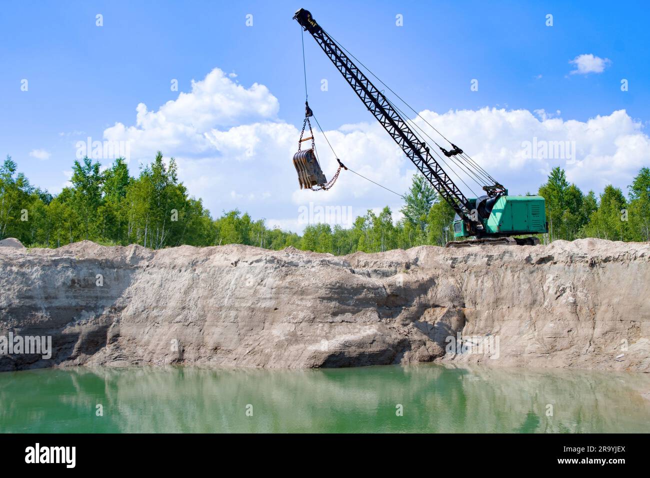 Industrialism. Huge sand Quarry in Poland. Rust and metal on machines ...
