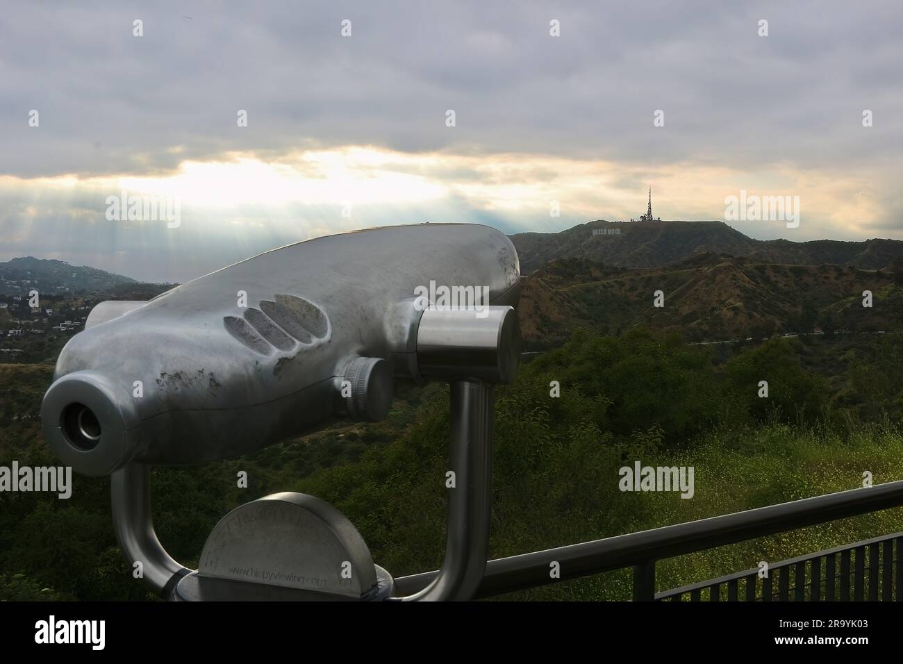 Telescope viewer with the distant Hollywood sign from the Griffith ...