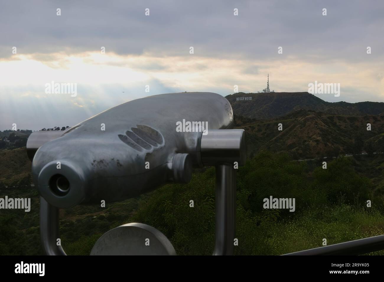 Telescope viewer with the distant Hollywood sign from the Griffith ...