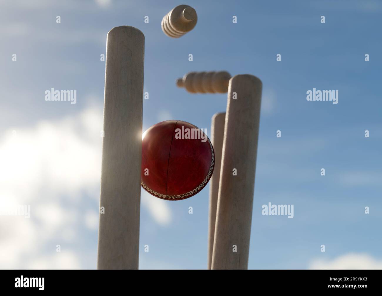 A red cricket ball striking wooden cricket wickets with dislodging ...