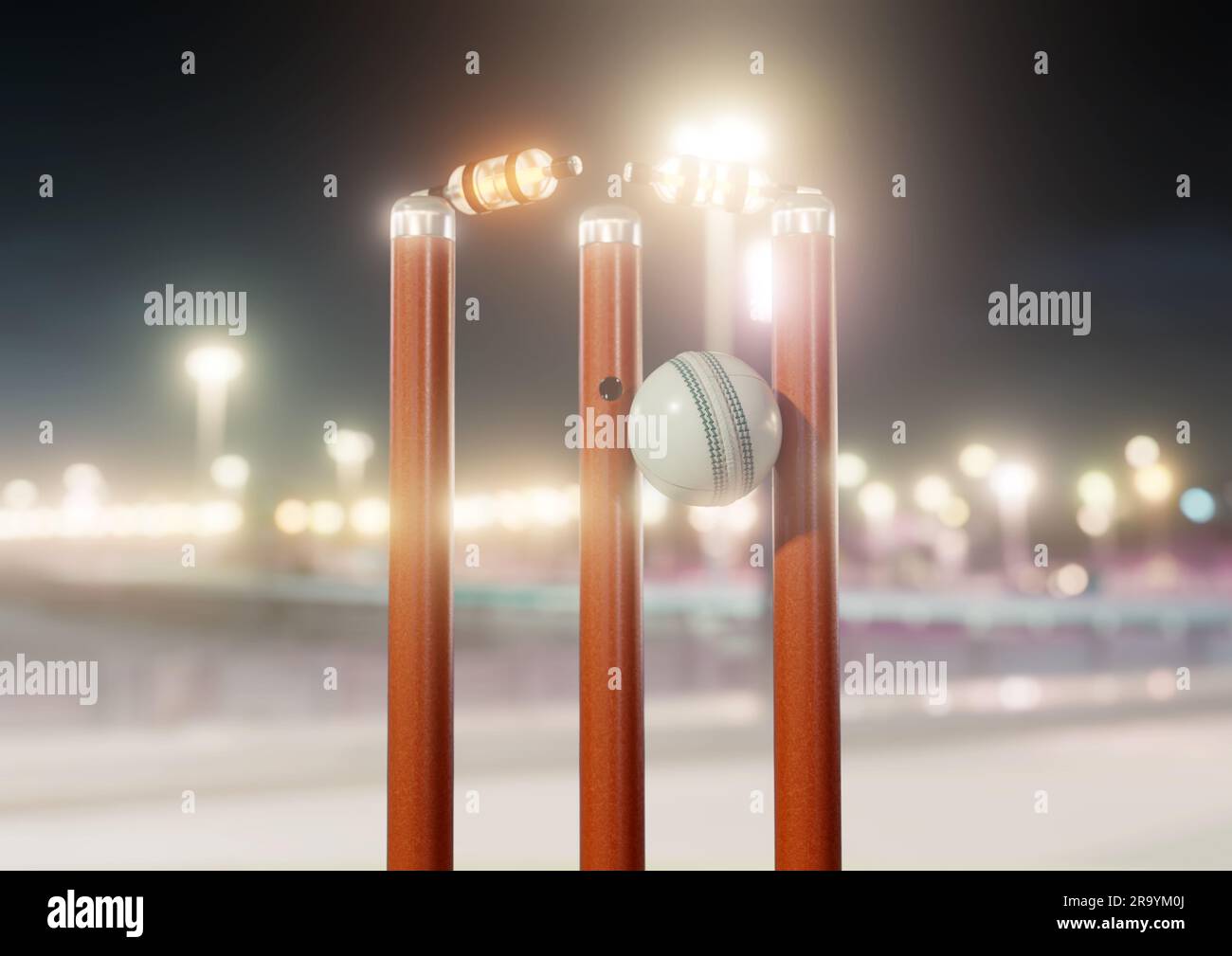 A red cricket ball striking wooden cricket wickets with dislodging ...