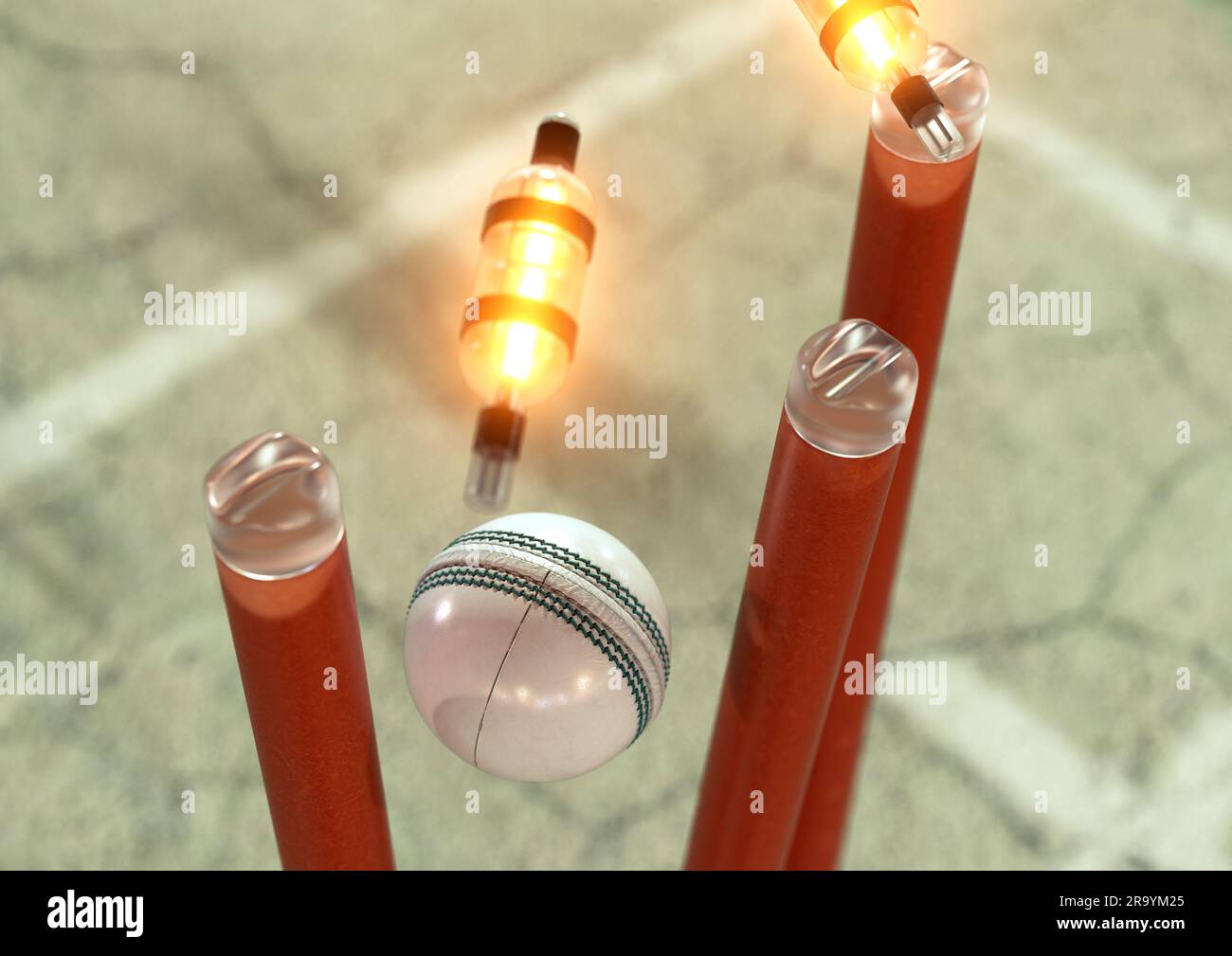 A white cricket ball striking orange electronic cricket wickets with ...