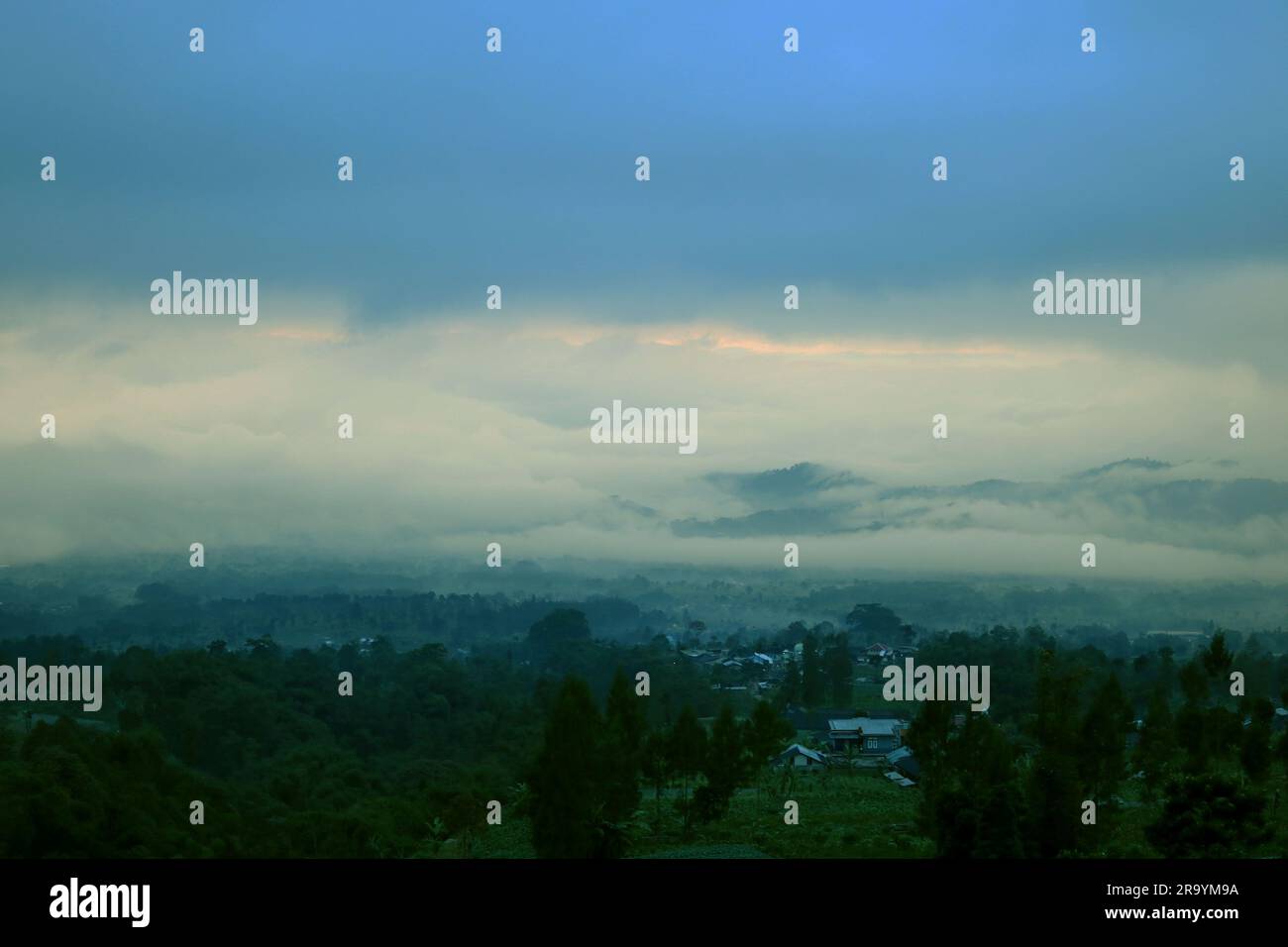Panoramic photo of an object with a misty mountain background in the ...