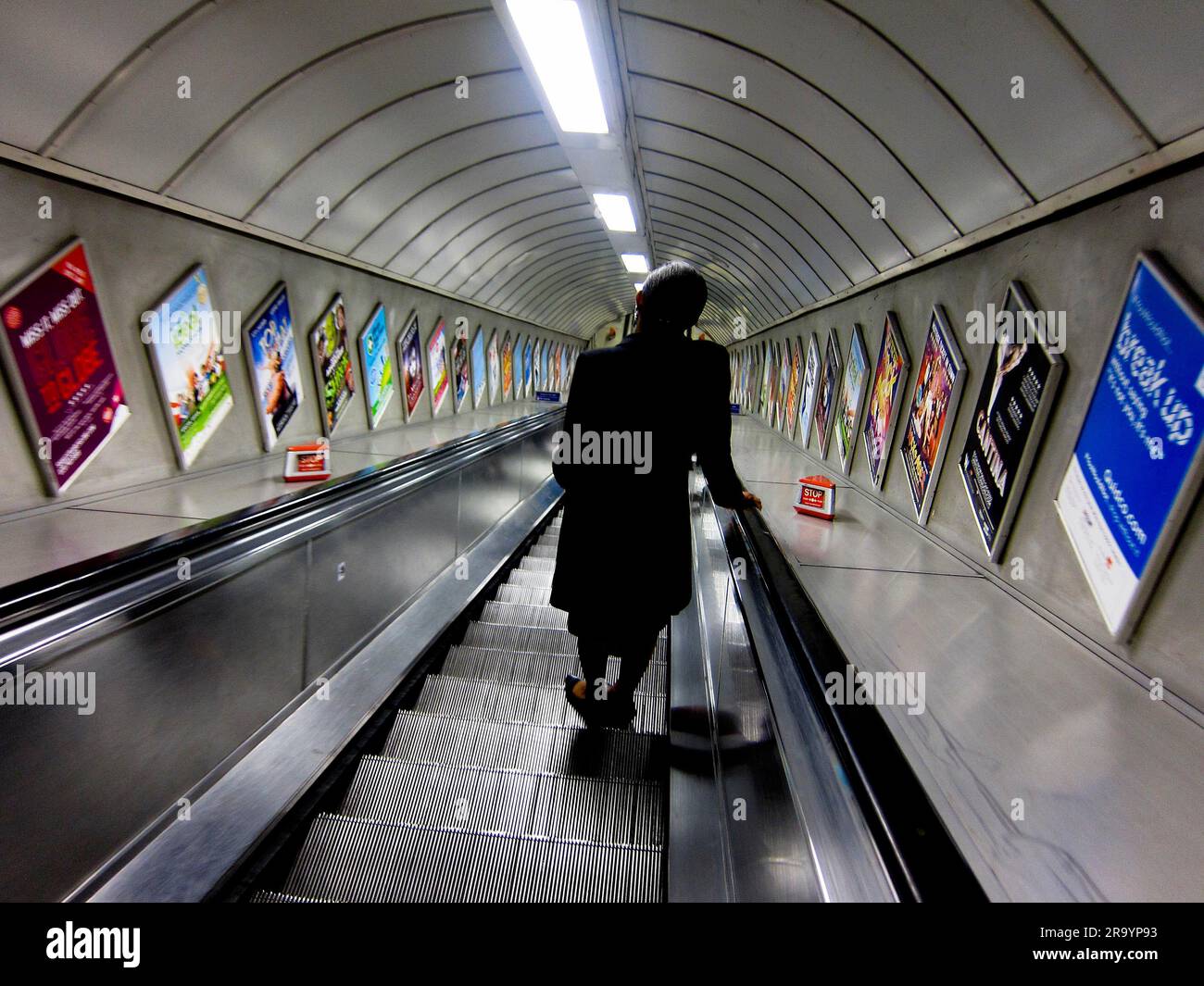 Underground escalator hi-res stock photography and images - Alamy
