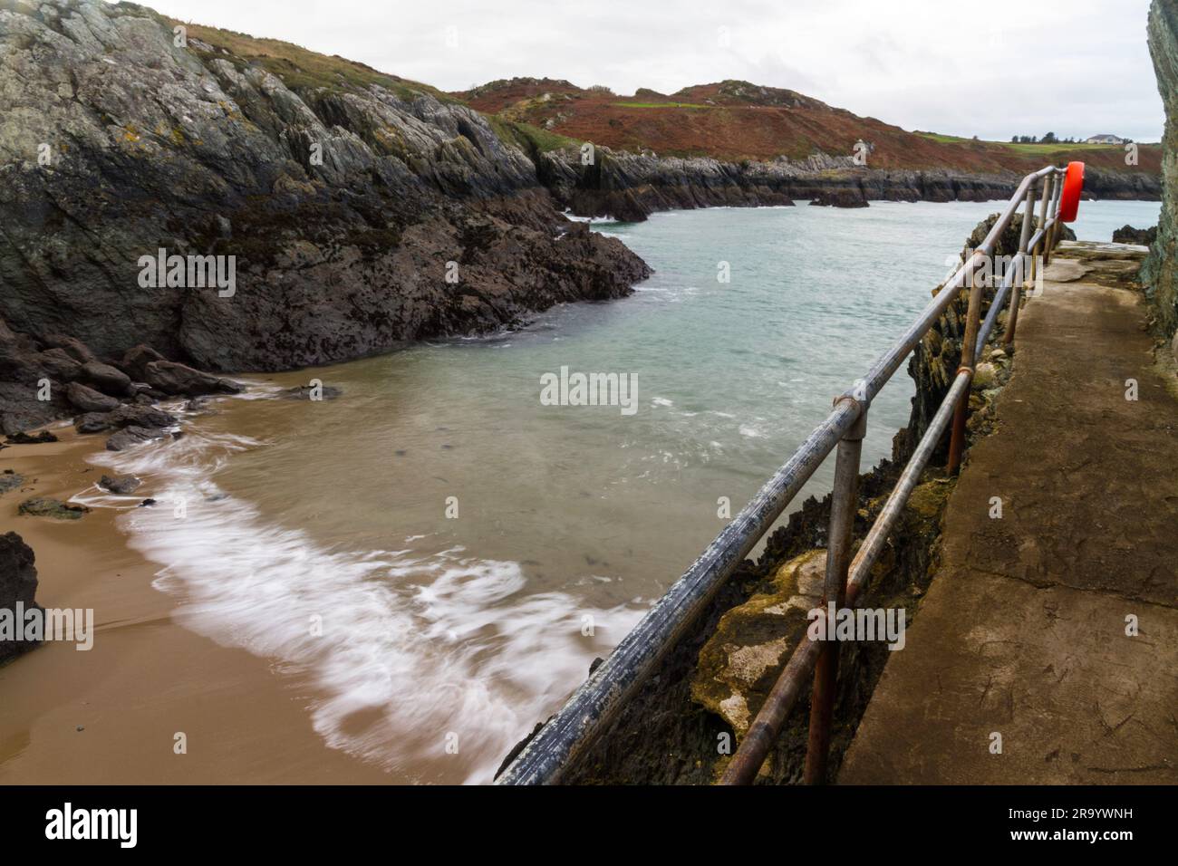 Walkway with Hand Rails at the small bay the Creek or or Traeth Dynion ...